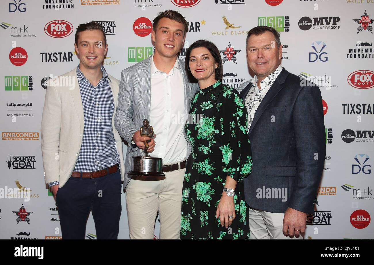 Patrick Cripps of the Blues (second from left) poses for a photograph ...