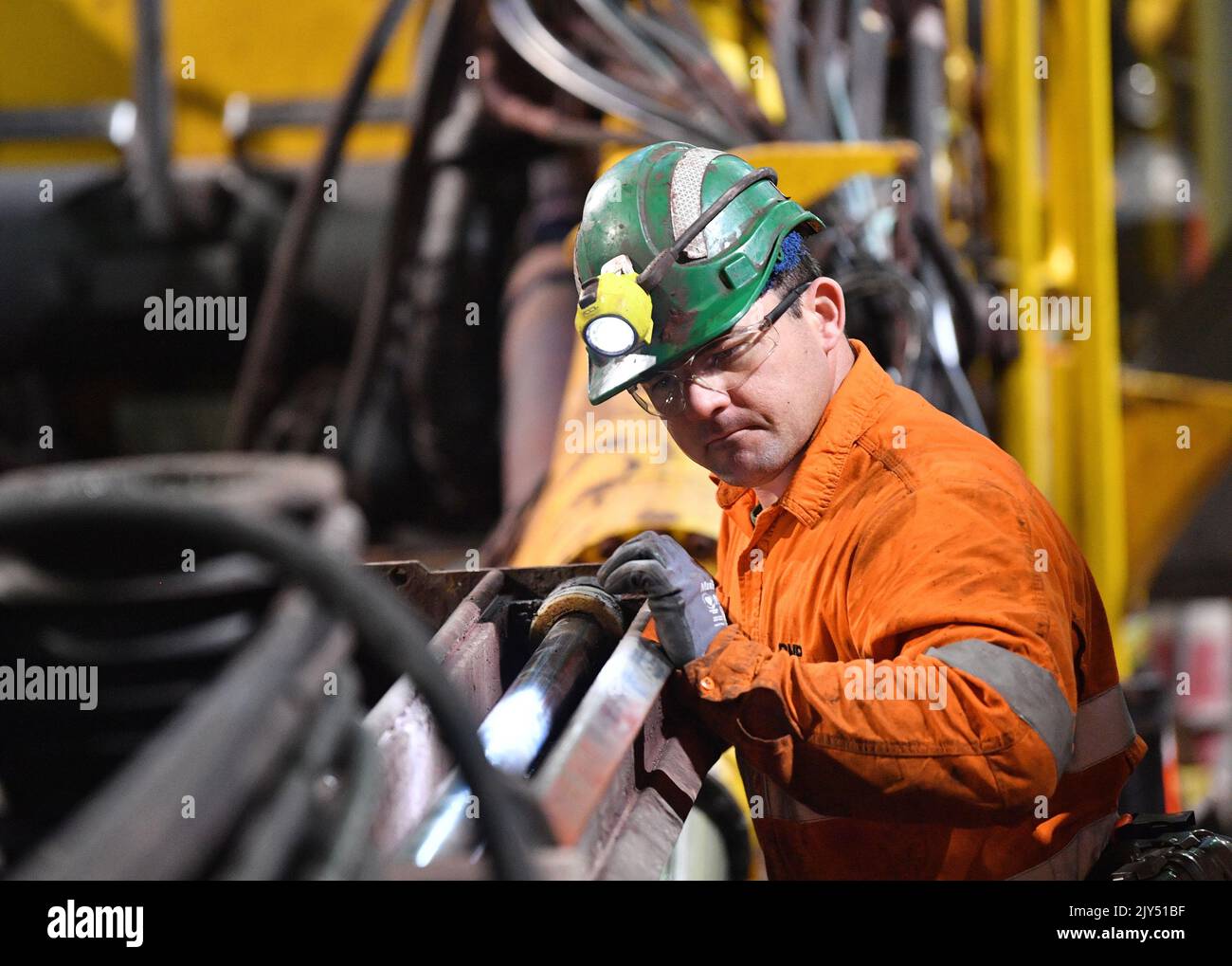 A BHP worker is seen during a tour of the Olympic Dam mine site in ...