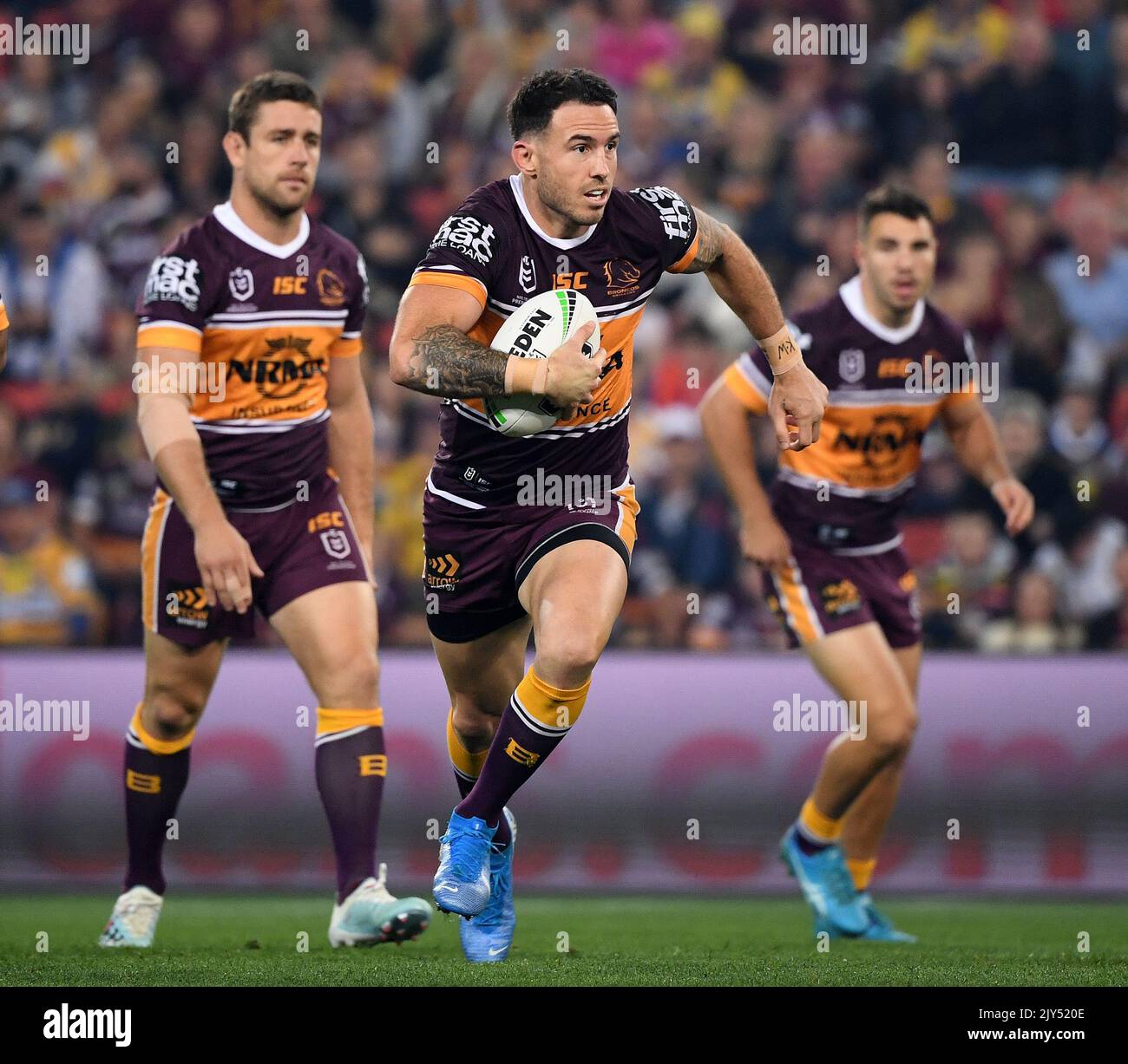 Darius Boyd of the Broncos (centre) during the Round 24 NRL match ...