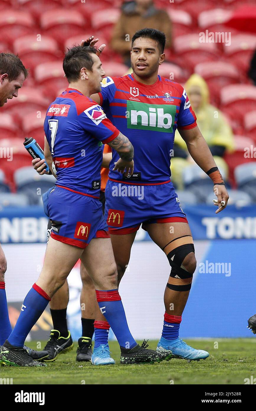 Hymel Hunt of the Knights congratulates Mitchell Pearce on his first ...