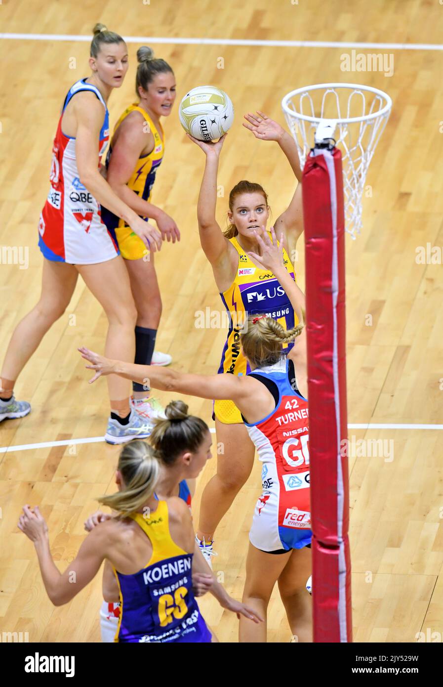 Stephanie Wood (centre) of the Lightning shoots for goal during the ...