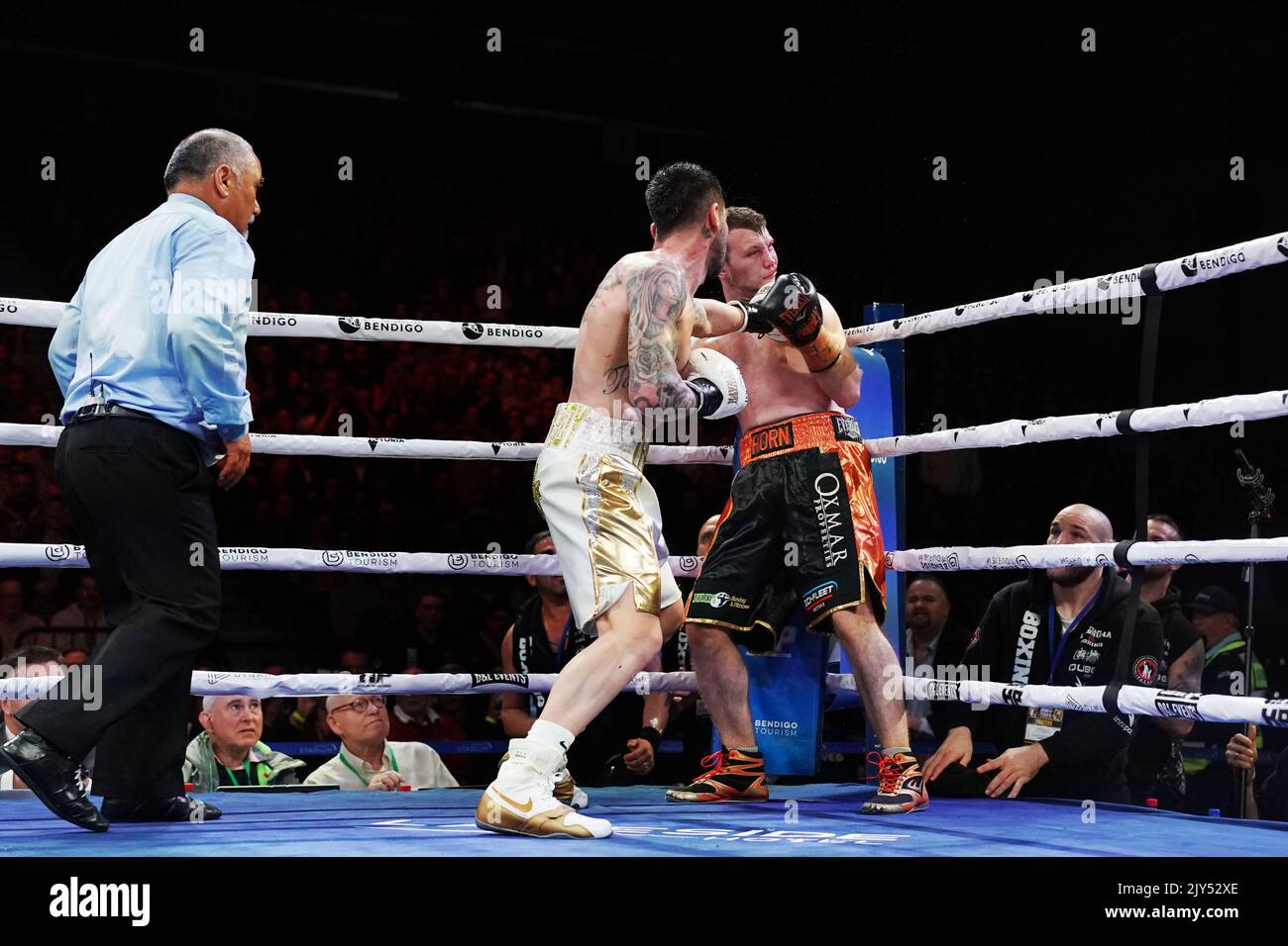 Australian boxer Jeff Horn (Right) is hit by Michael Zerafa moments ...