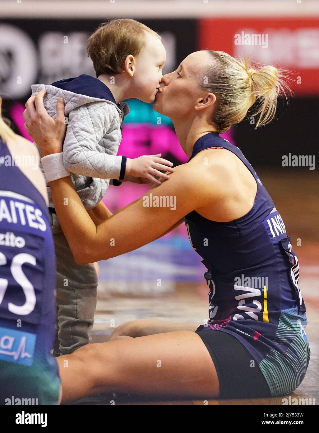 Renae Ingles of the Vixens kisses her son Jacob after winning the Super ...