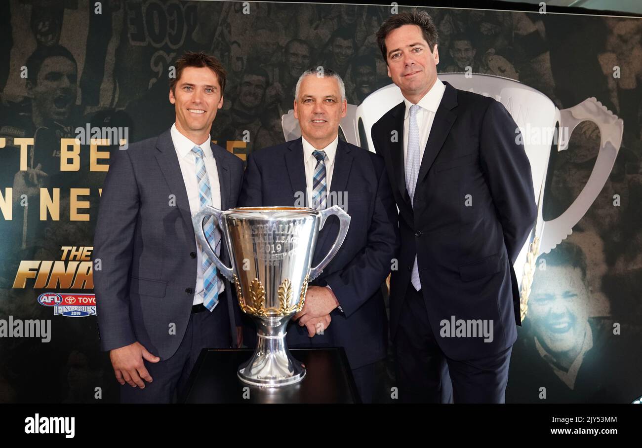 Norm Smith medal presenter Simon Black (L), the Jock McHale medal ...