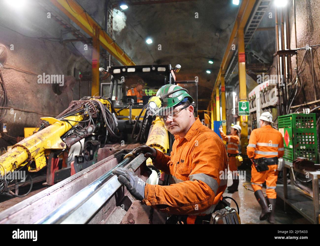 FILE - BHP worker is seen during a tour of the Olympic Dam mine site in Roxby Downs South ...