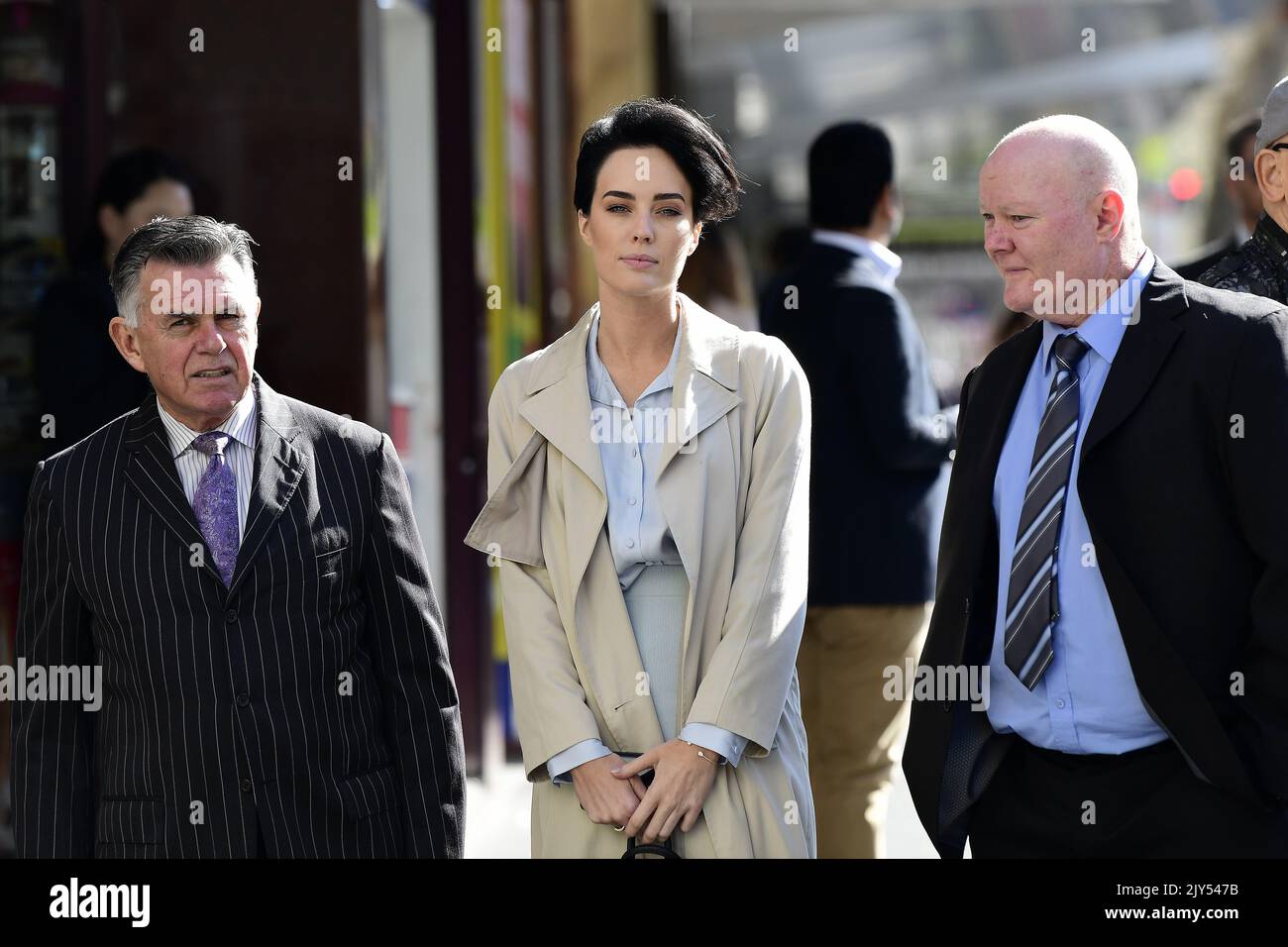 Sarah Budge (centre) and her lawyers arrive at Downing Centre District ...