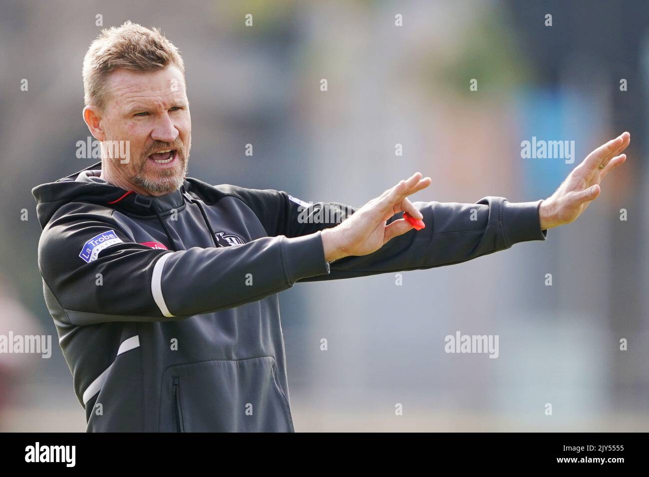 Magpies head coach Nathan Buckley instructs players during a ...