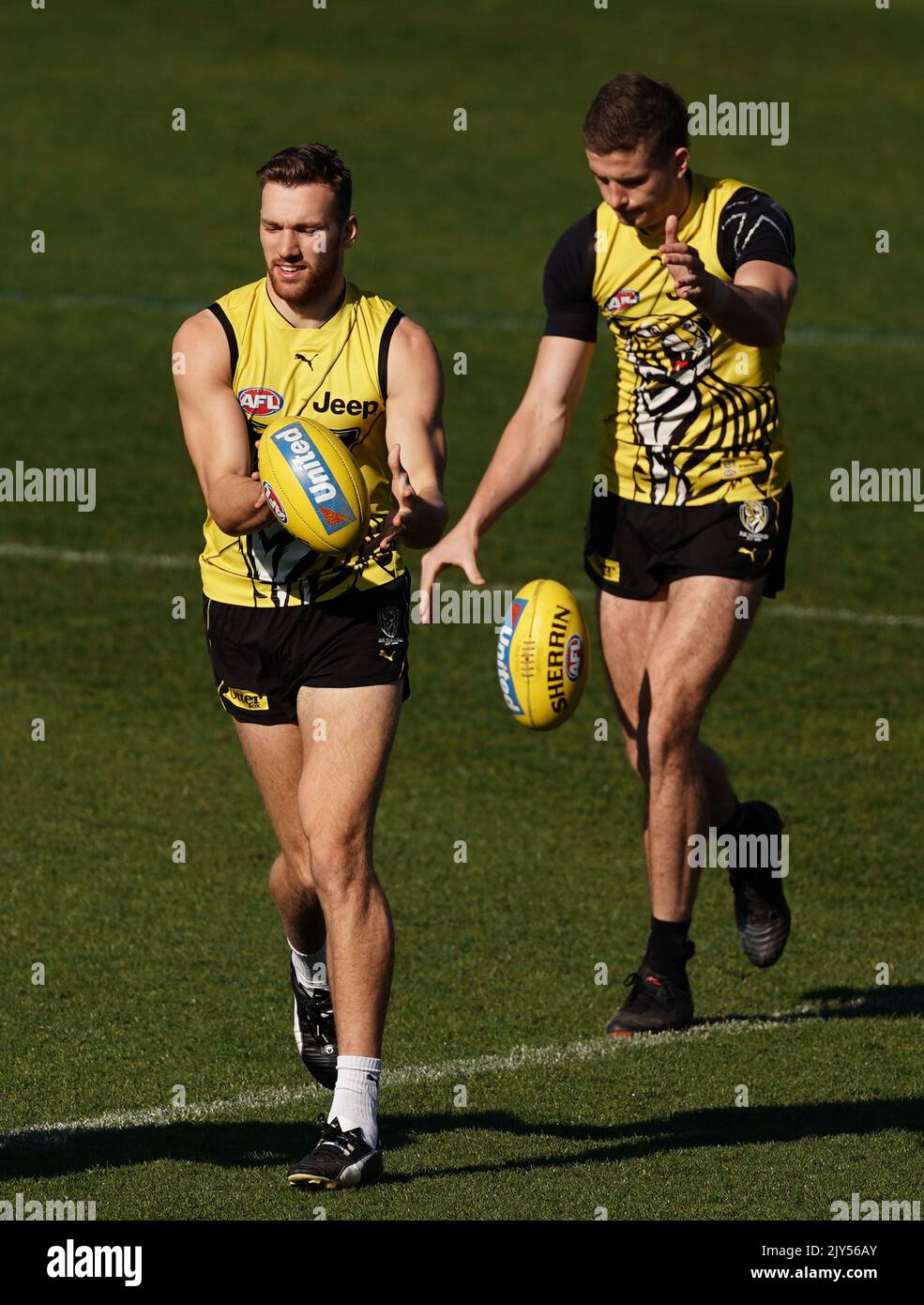 Noah Balta runs with the ball during a Richmond Tigers training session ...