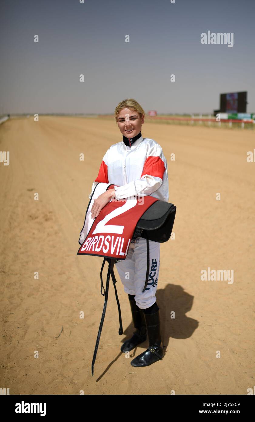 Jocky Minonette Kennedy poses for photos before their race at the ...