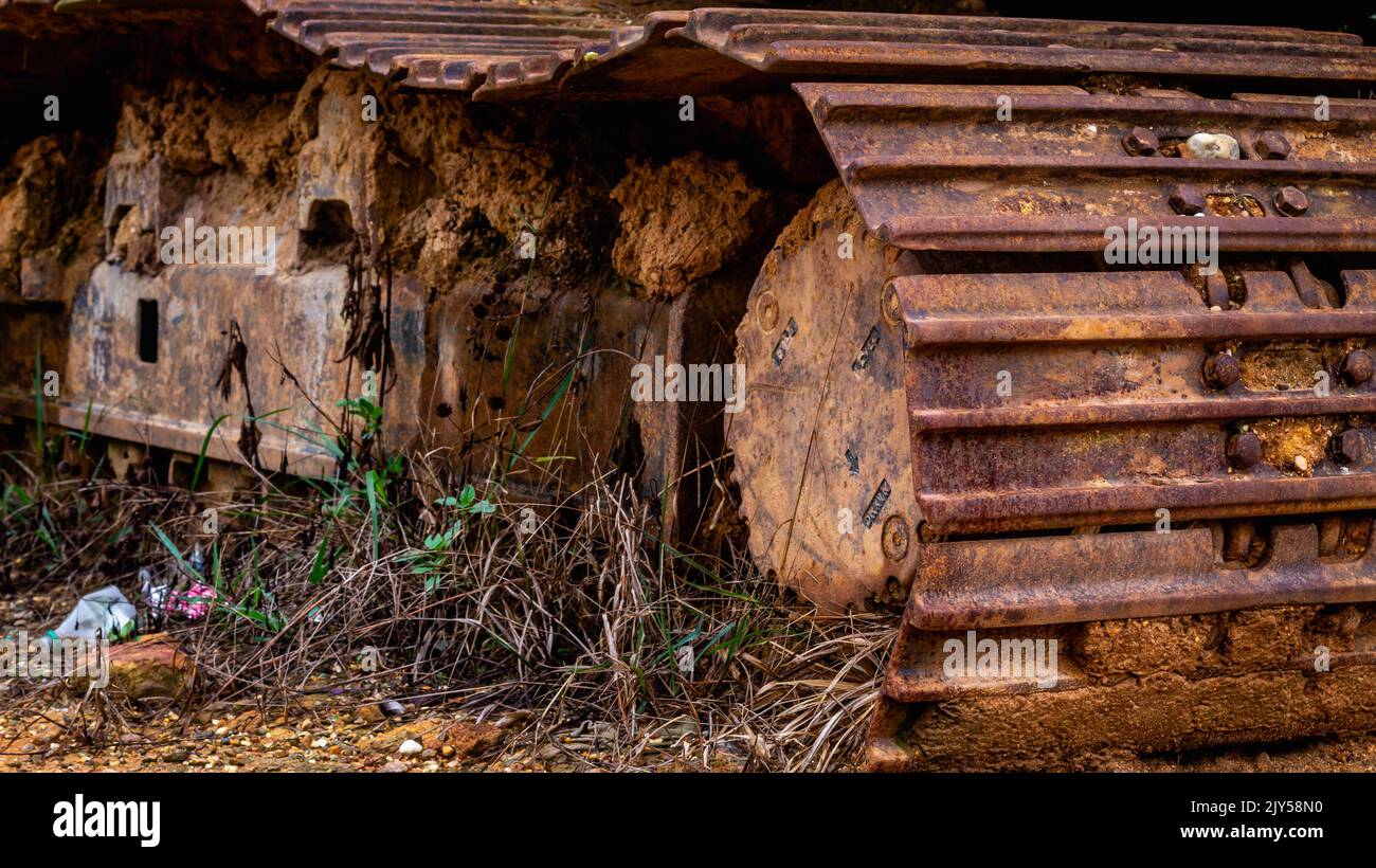 Rusty abandoned excavator in the junk yard Stock Photo - Alamy