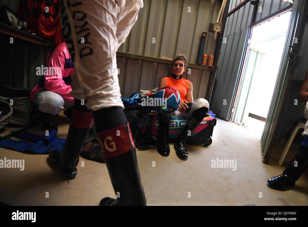 Jockey Cecily Eaton is seen between races at the Birdsville Races in ...