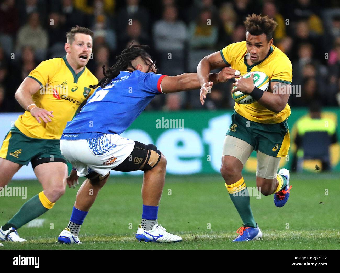 TJ Ioane of Samoa tackles Will Genia of the Wallabies during the ...