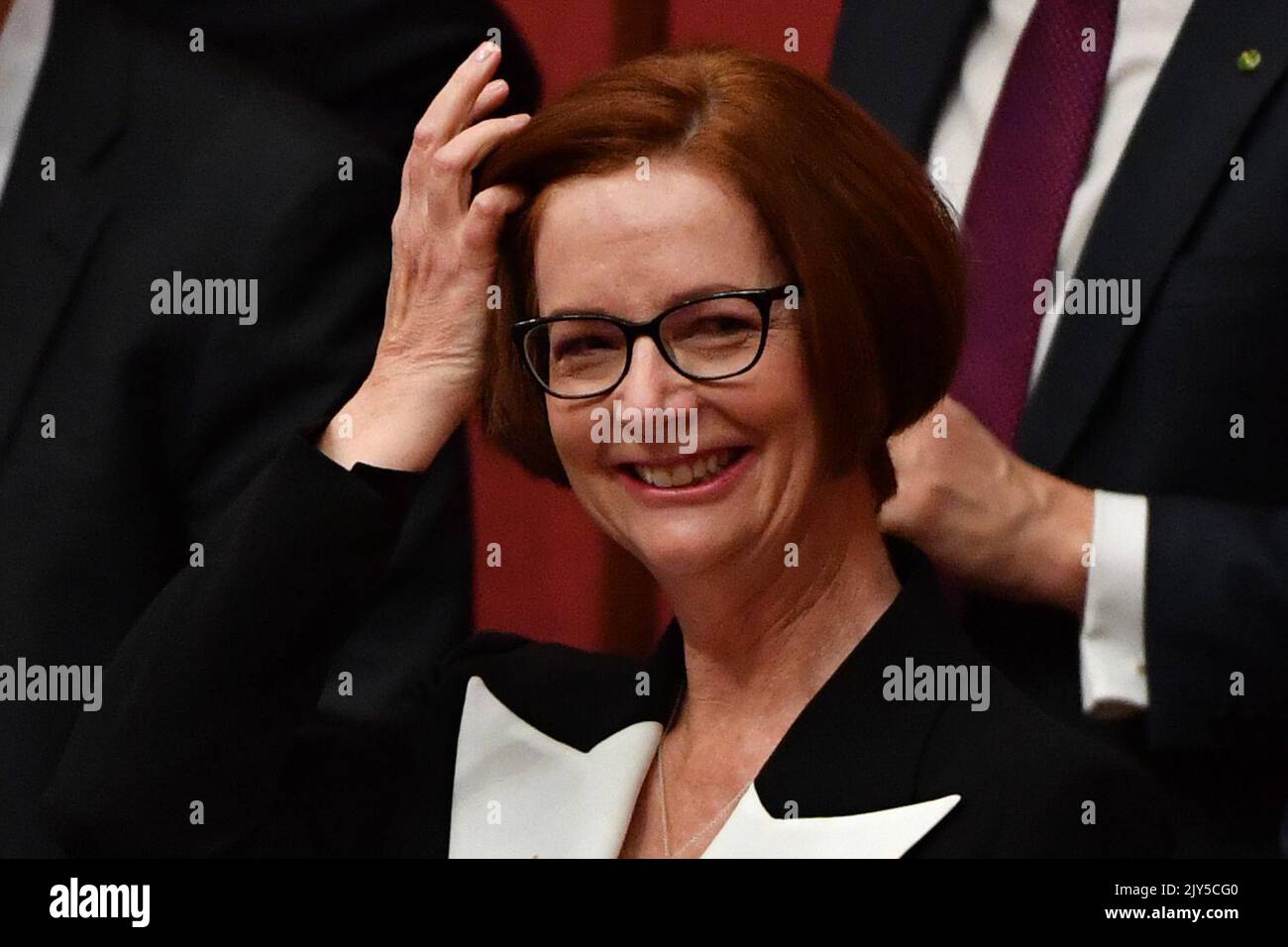 Former prime minister Julia Gillard smiles after Labor Senator Marielle ...