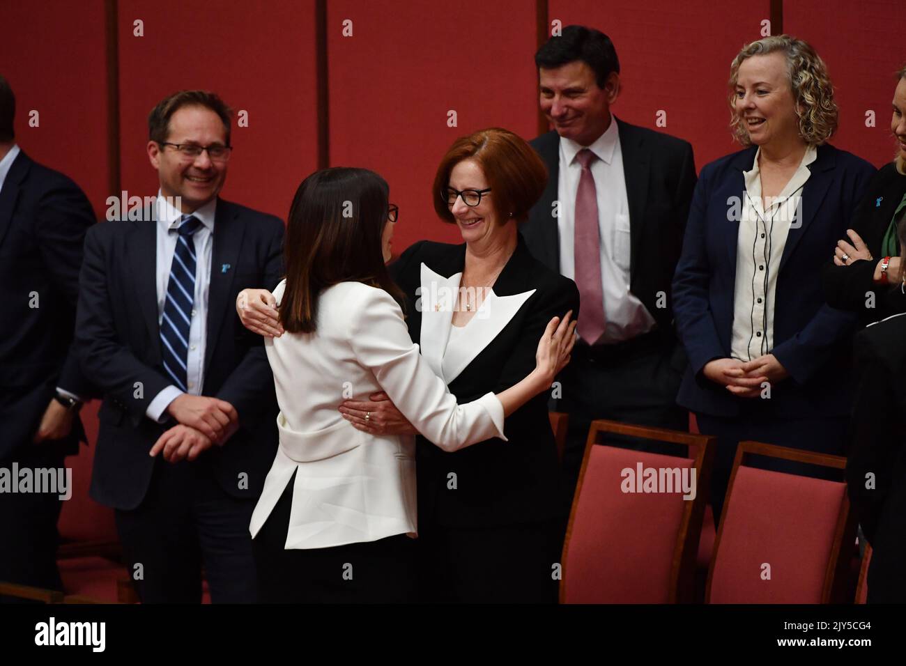 Former prime minister Julia Gillard hugs Labor Senator Marielle Smith ...