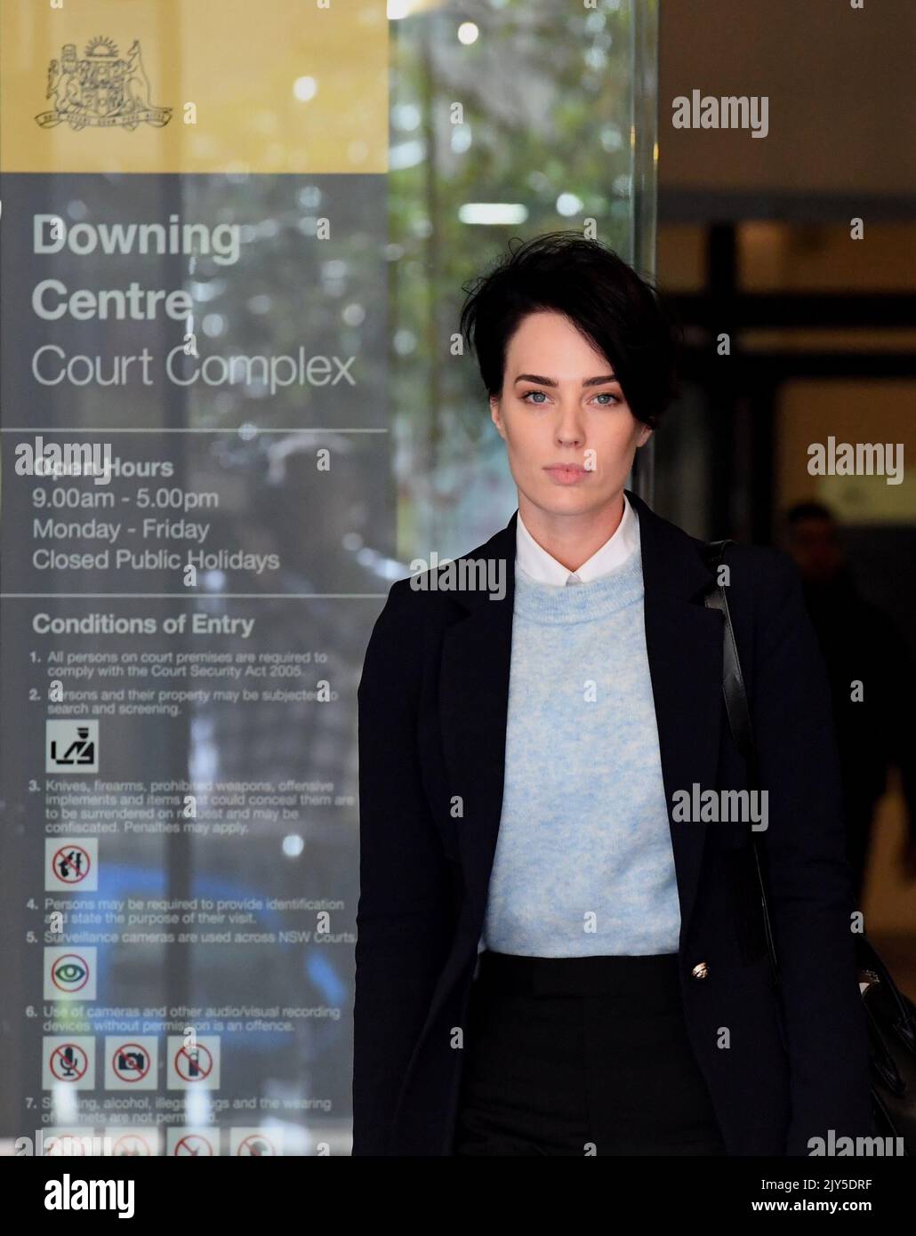 Sarah Budge leaves the Downing Centre Court in Sydney, Friday ...