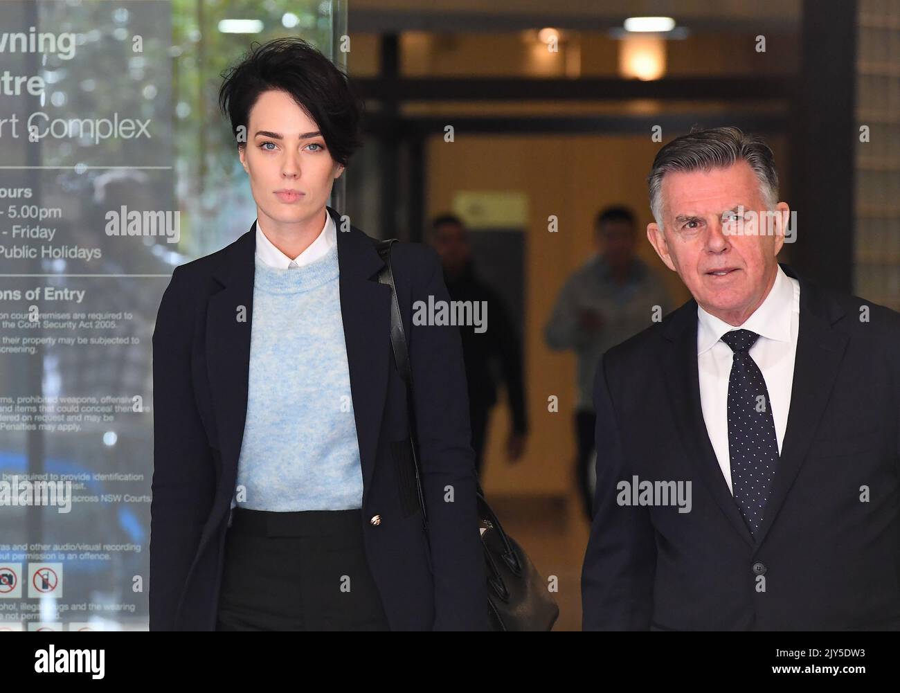 Sarah Budge leaves the Downing Centre Court in Sydney, Friday ...