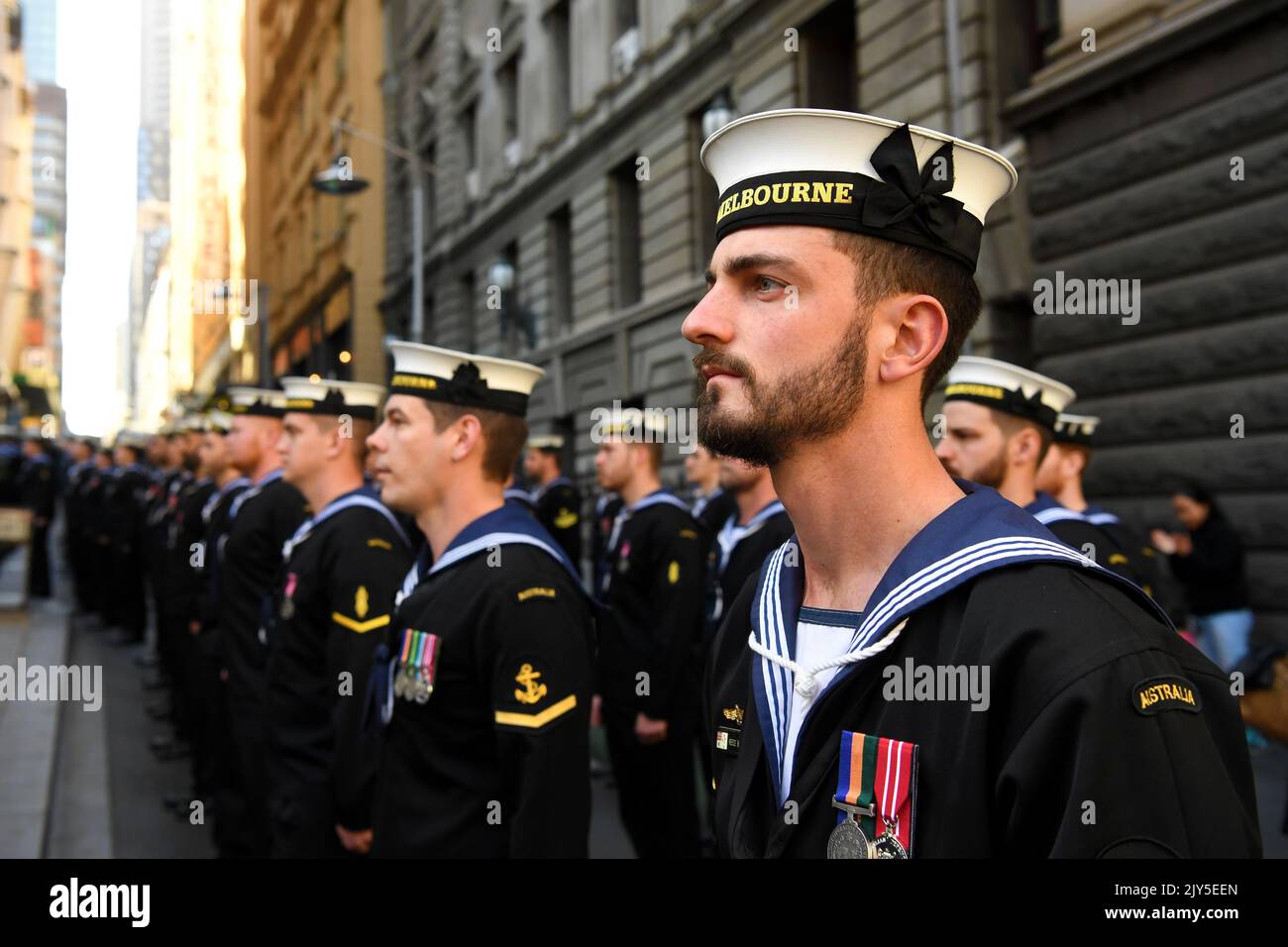 Royal Australian Navy Officers and Sailors from HMAS Melbourne are seen ...