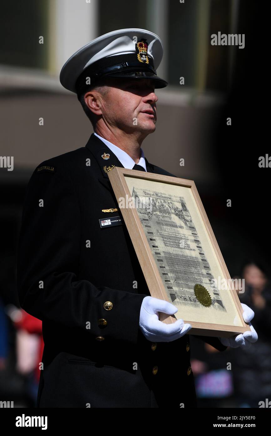 Royal Australian Navy Officers and Sailors from HMAS Melbourne are seen ...