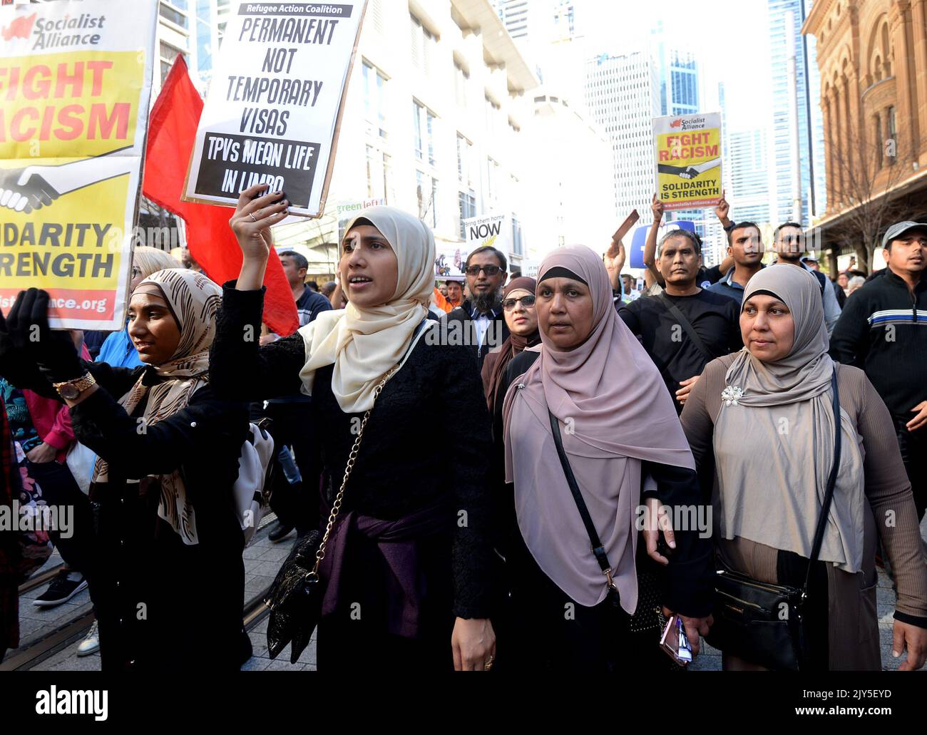 Demonstrators march through Sydney's CBD during a rally calling for ...