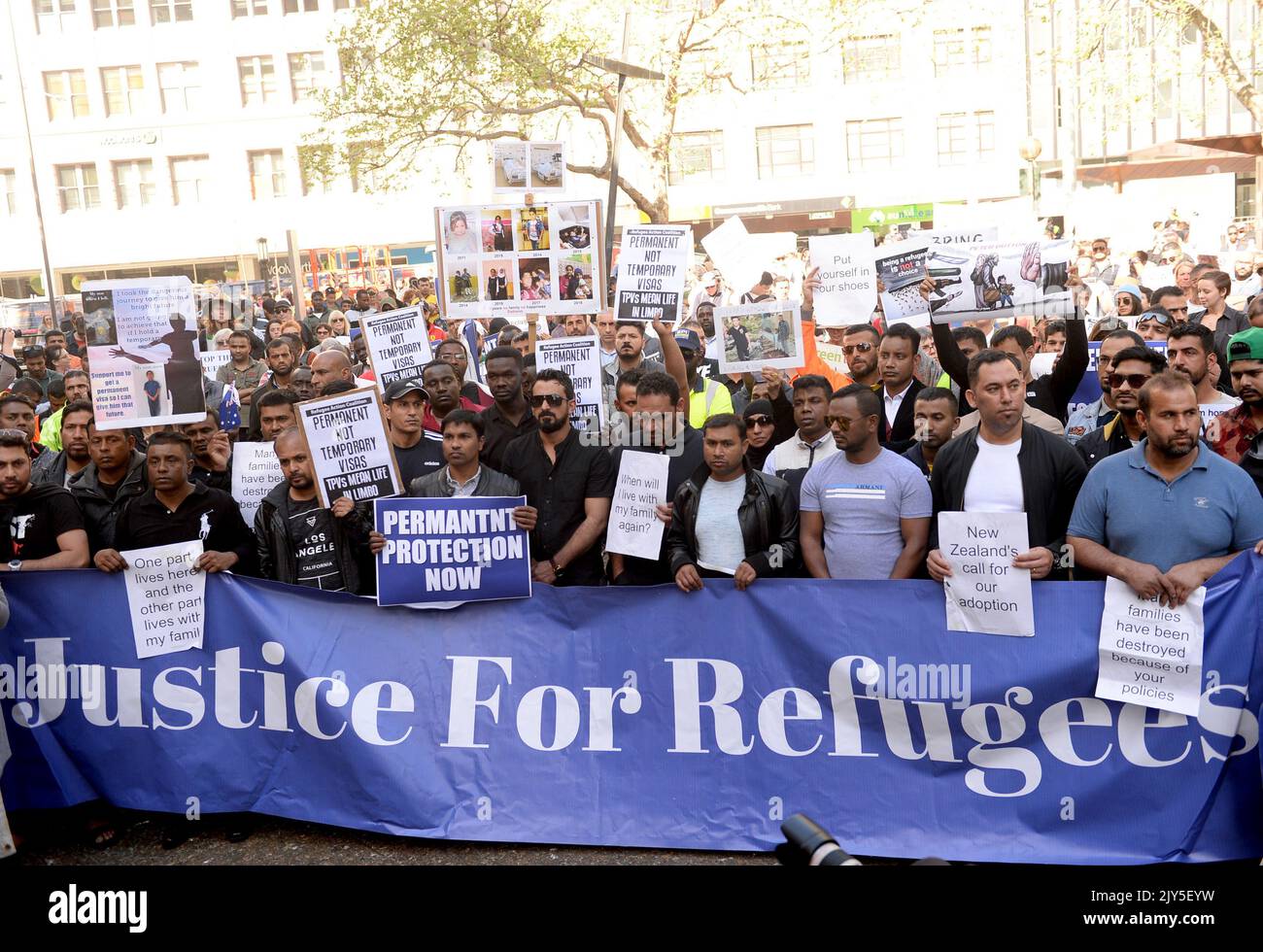 Demonstrators march through Sydney's CBD during a rally calling for ...