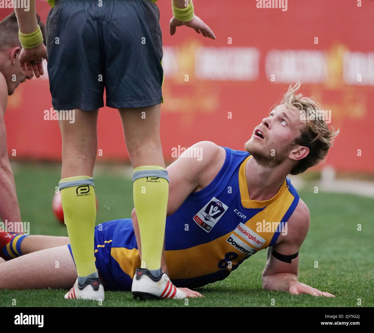 Nick Mellington of Williamstown reacts after being reported for ...