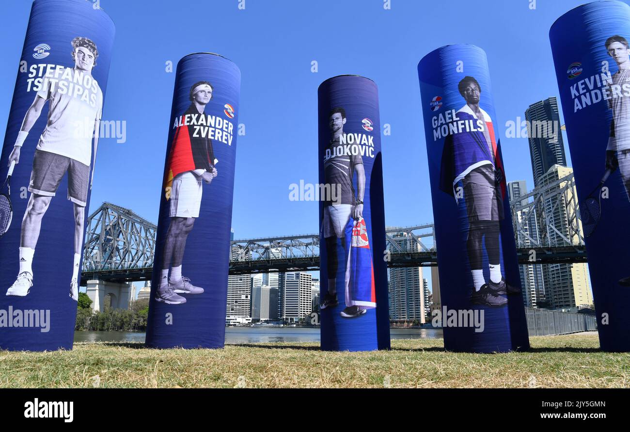 Photographs of players from participating countries are seen on display ...