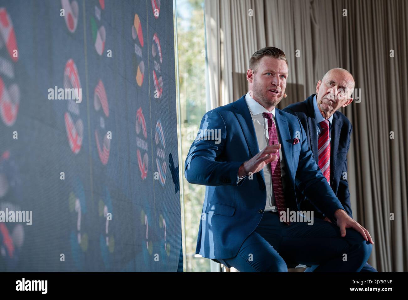 Former Australian tennis players and commentators Sam Groth (left) and ...