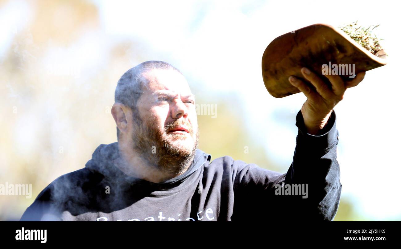 Allan Sumner performs a smoking ceremony at the unveiling of the Tom ...