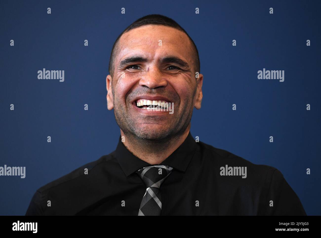 Australian boxer Anthony "The Man" Mundine smiles during a press ...