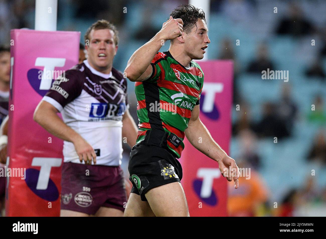 Cameron Murray of the Rabbitohs celebrates after scoring a try during ...