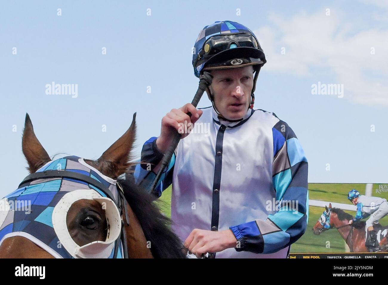 Jockey Mark Zahra returns to scale after riding Junipal to victory in ...
