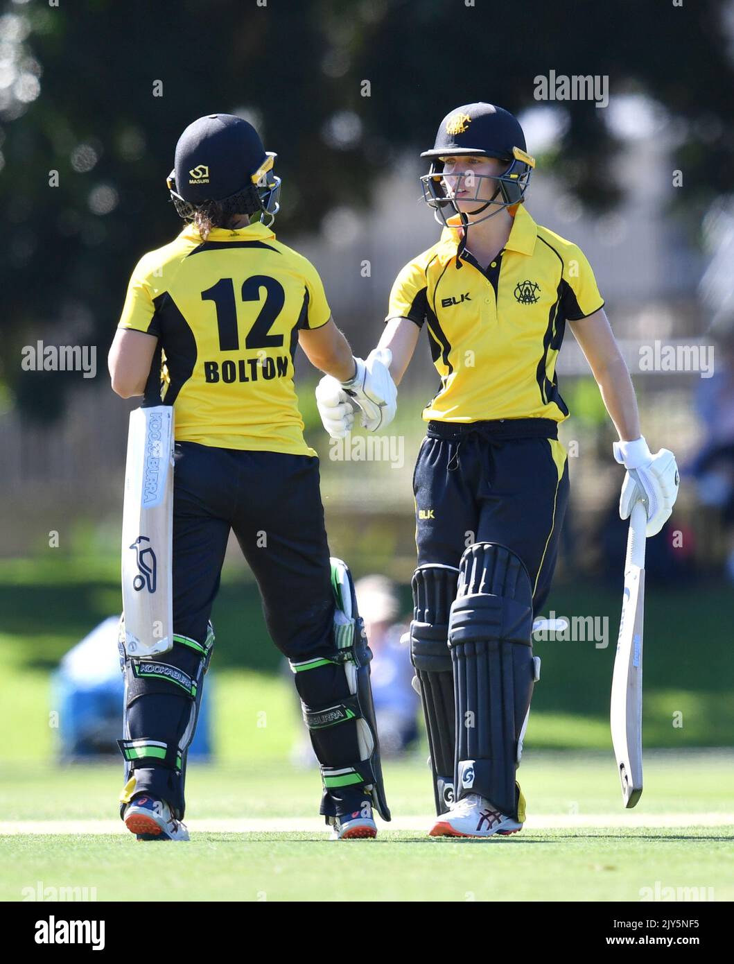 Chloe Piparo (right) of the Western Fury celebrates her half century ...