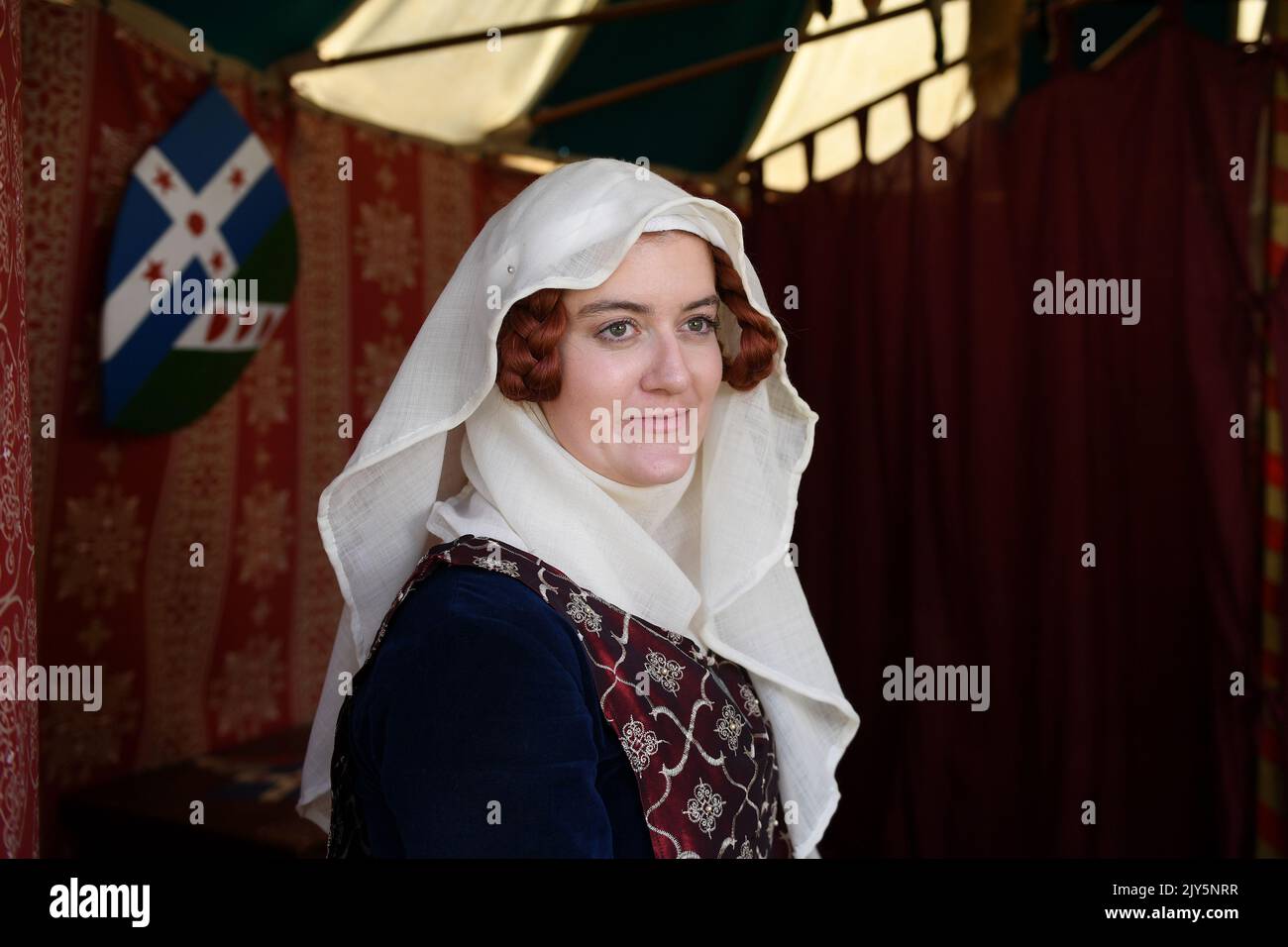15th century reenactor Alice Wright poses for a photograph during the ...
