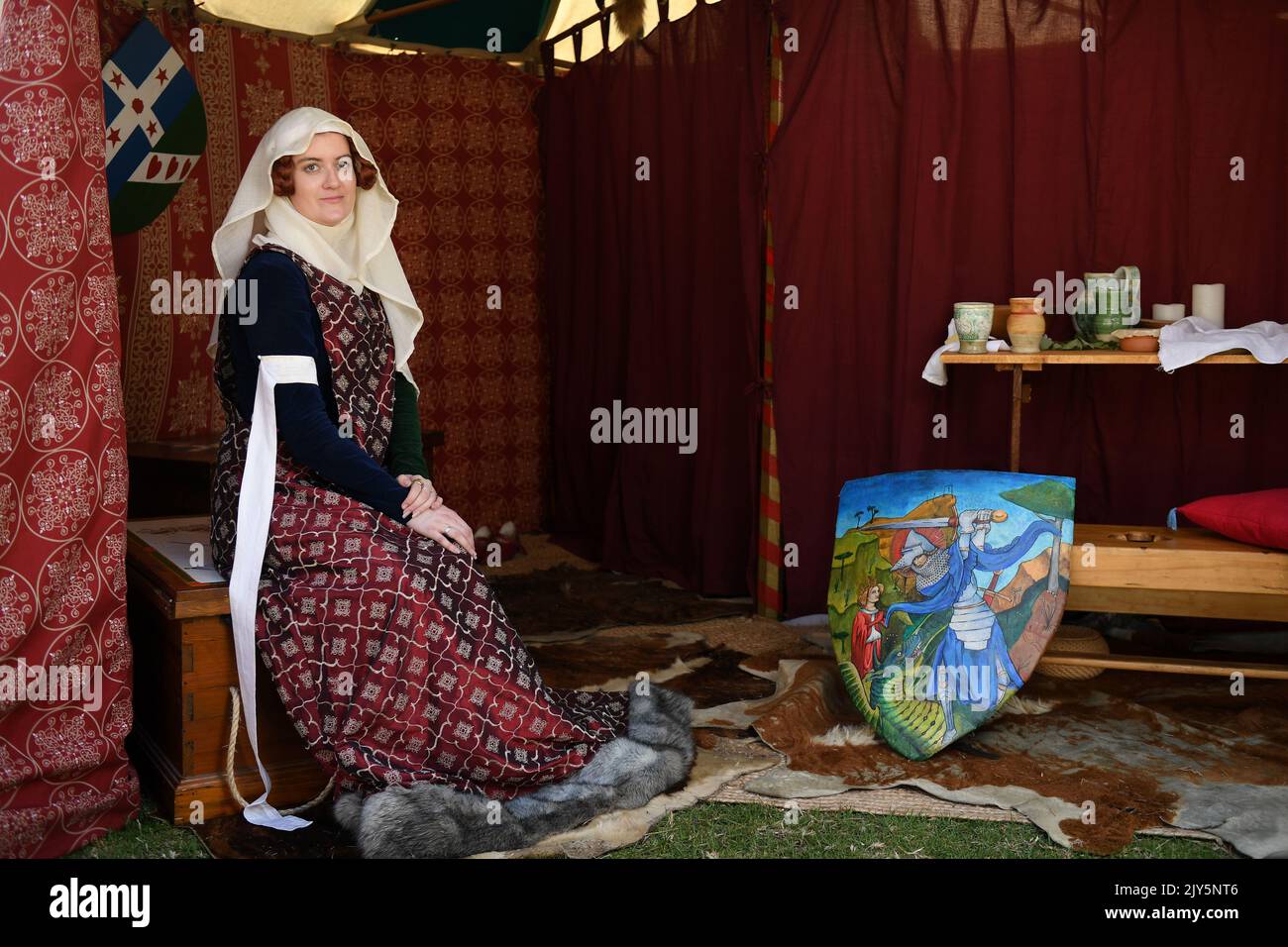 15th century reenactor Alice Wright poses for a photograph during the ...