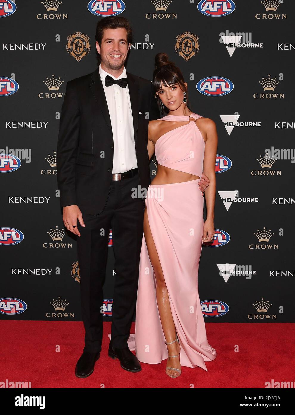 Ben Stratton of the Hawks and Laura Griffin arrive at the 2019 Brownlow ...