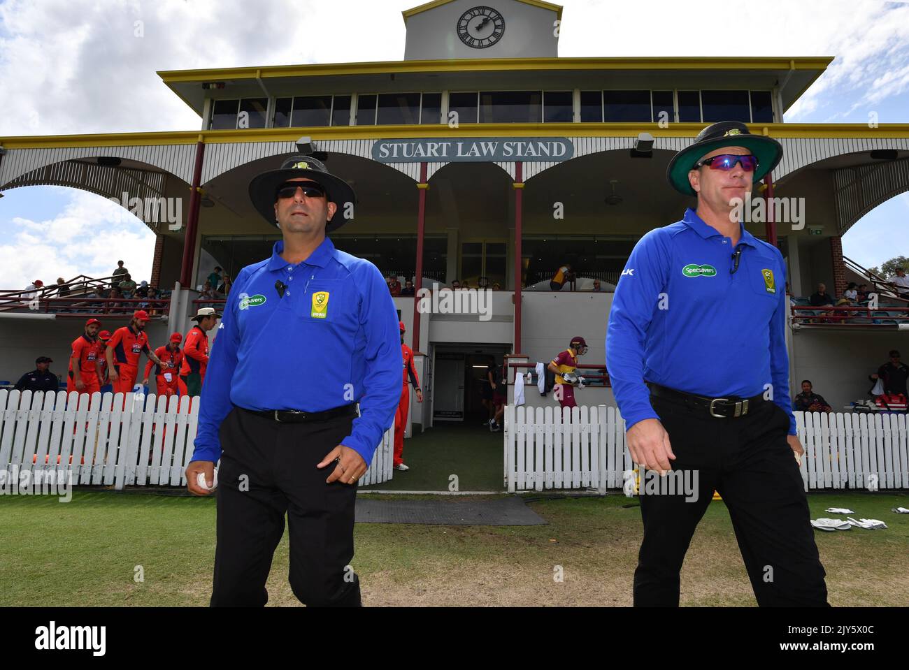 Umpires Gerard Abood (left) and Donovan Koch (right) are seen during ...