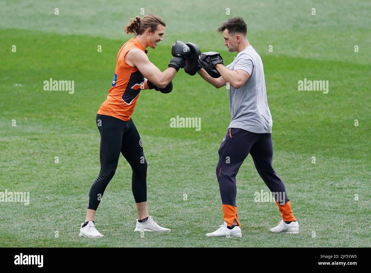 Phil Davis of the Giants boxes during a GWS Giants AFL training session ...
