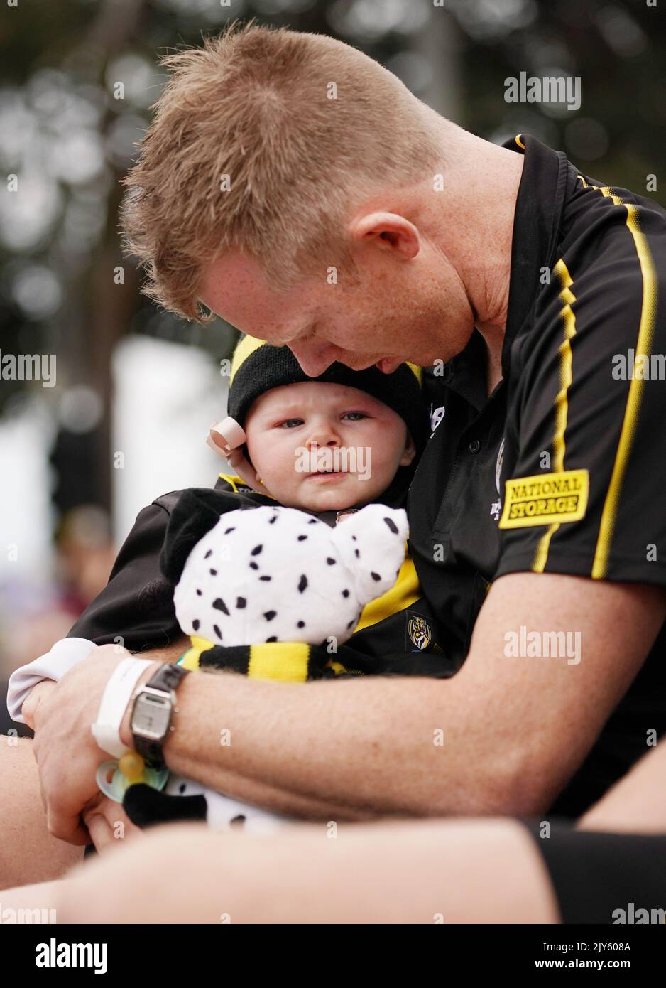 Jack Riewoldt of the Tigers takes part with his daughter during the AFL ...