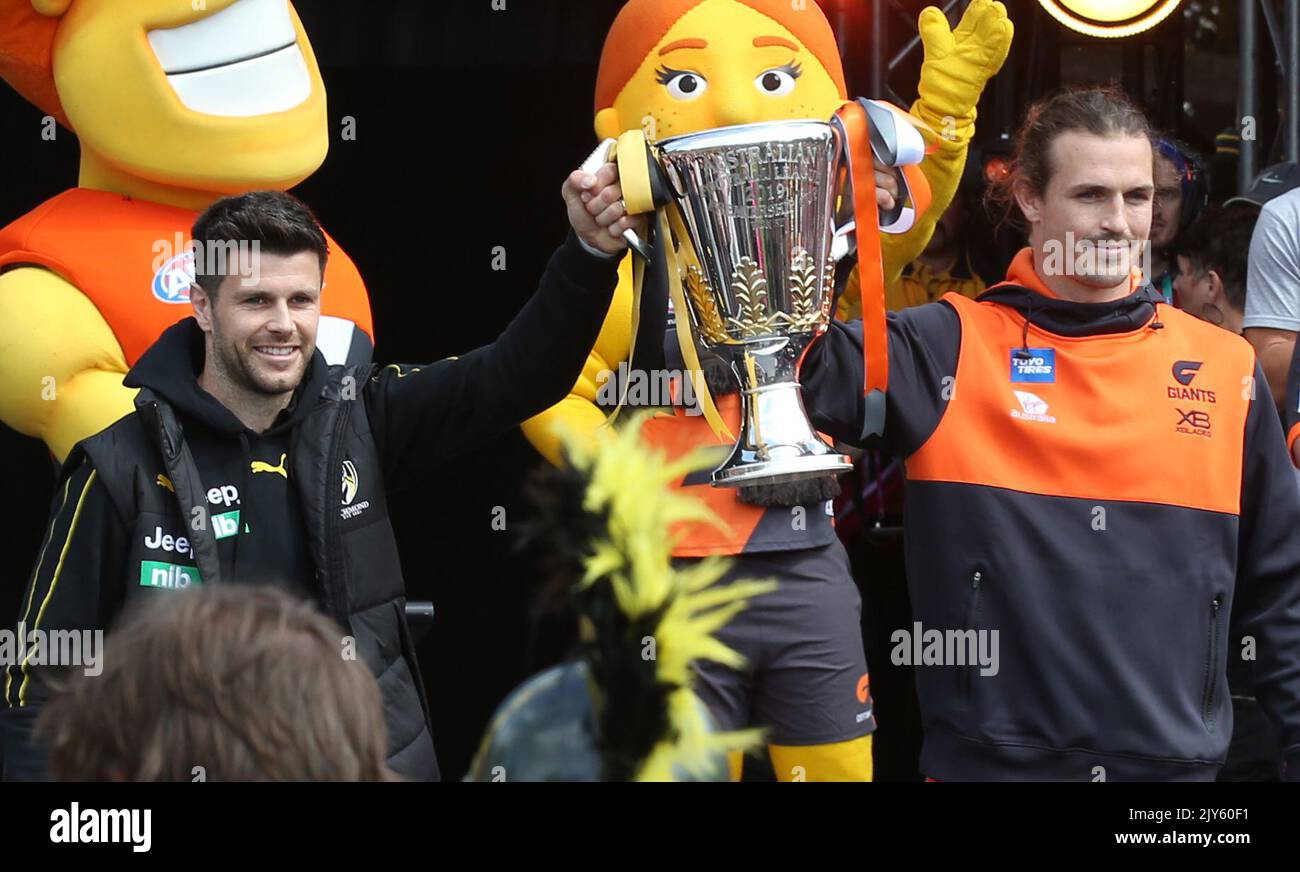 Richmond captain Trent Cotchin and GWS captain Phil Davis during the ...