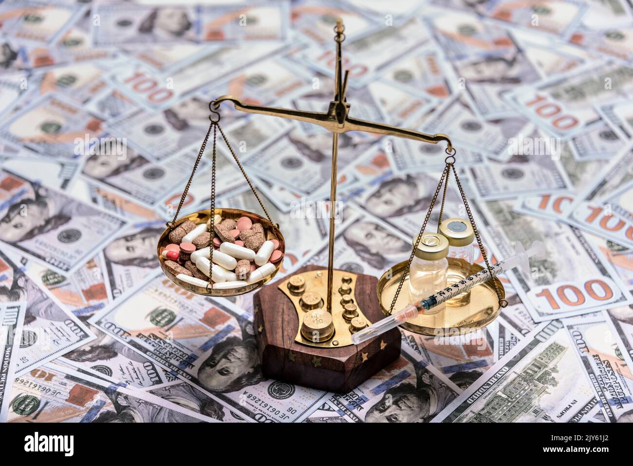 Pills money scales hi-res stock photography and images - Alamy