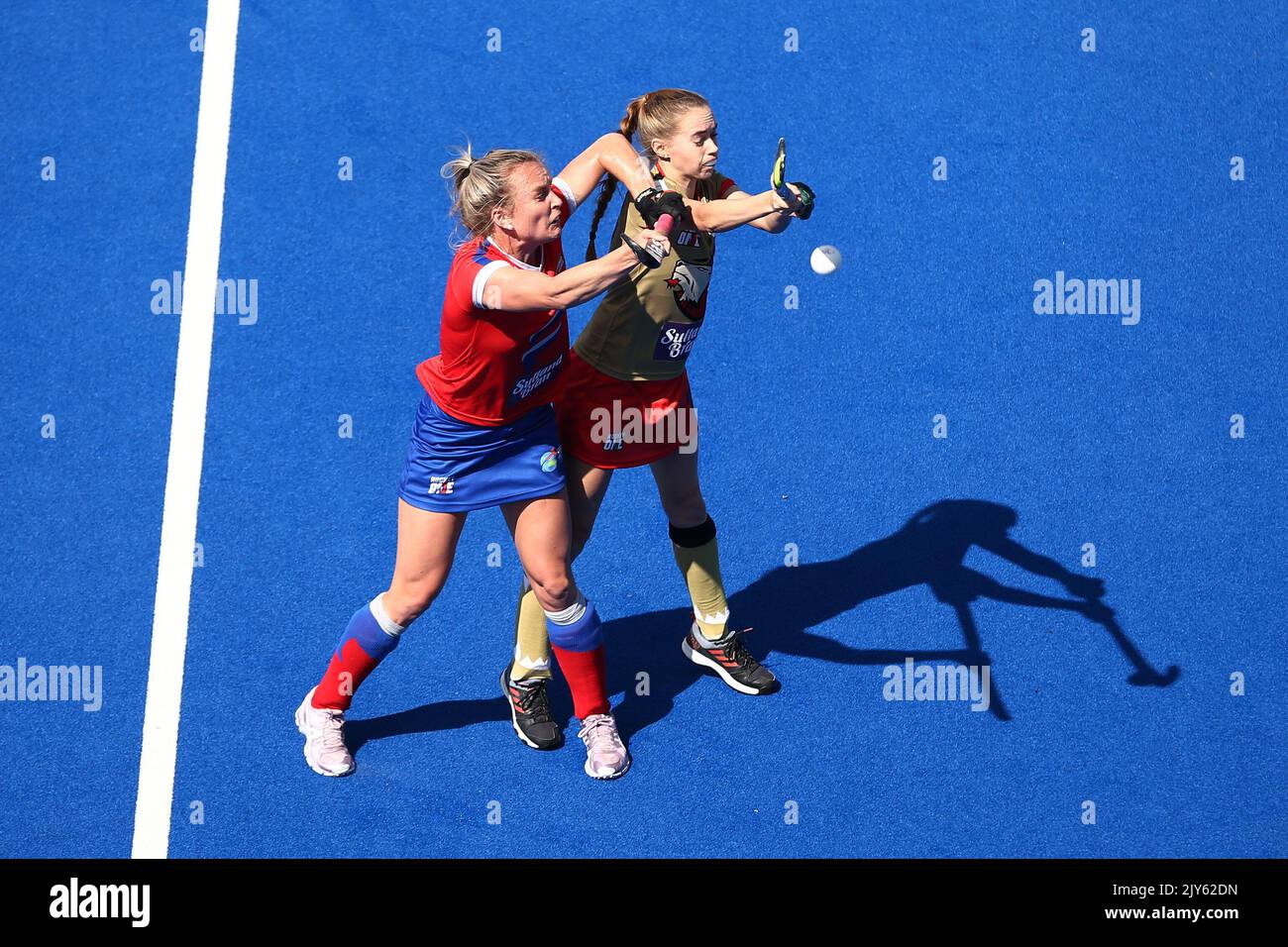 Mikaela Patterson of the Pride competes with Jane Claxton of the Fire ...