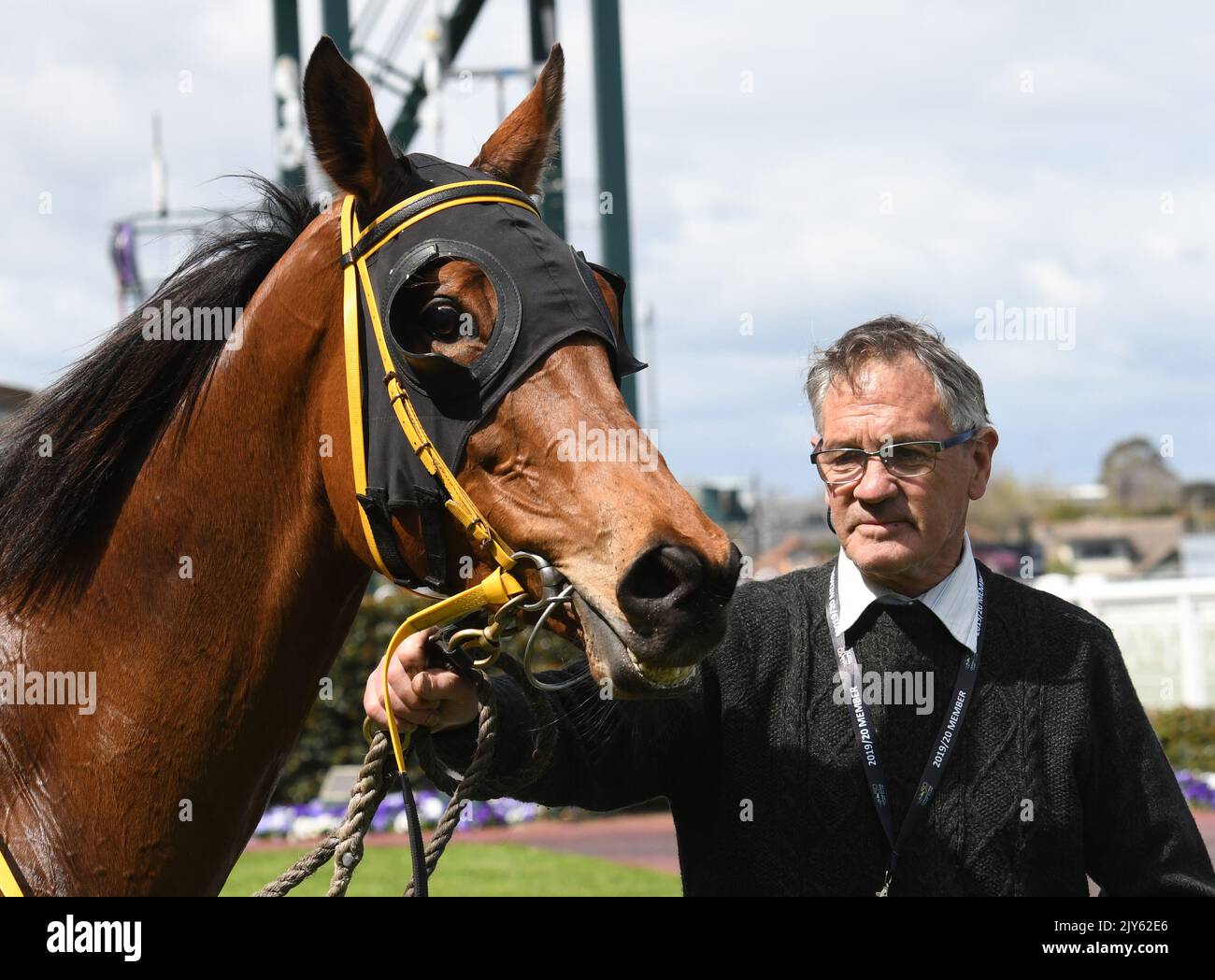 Trainer Allan Cooper poses with No Effort after winning race 1, the ...