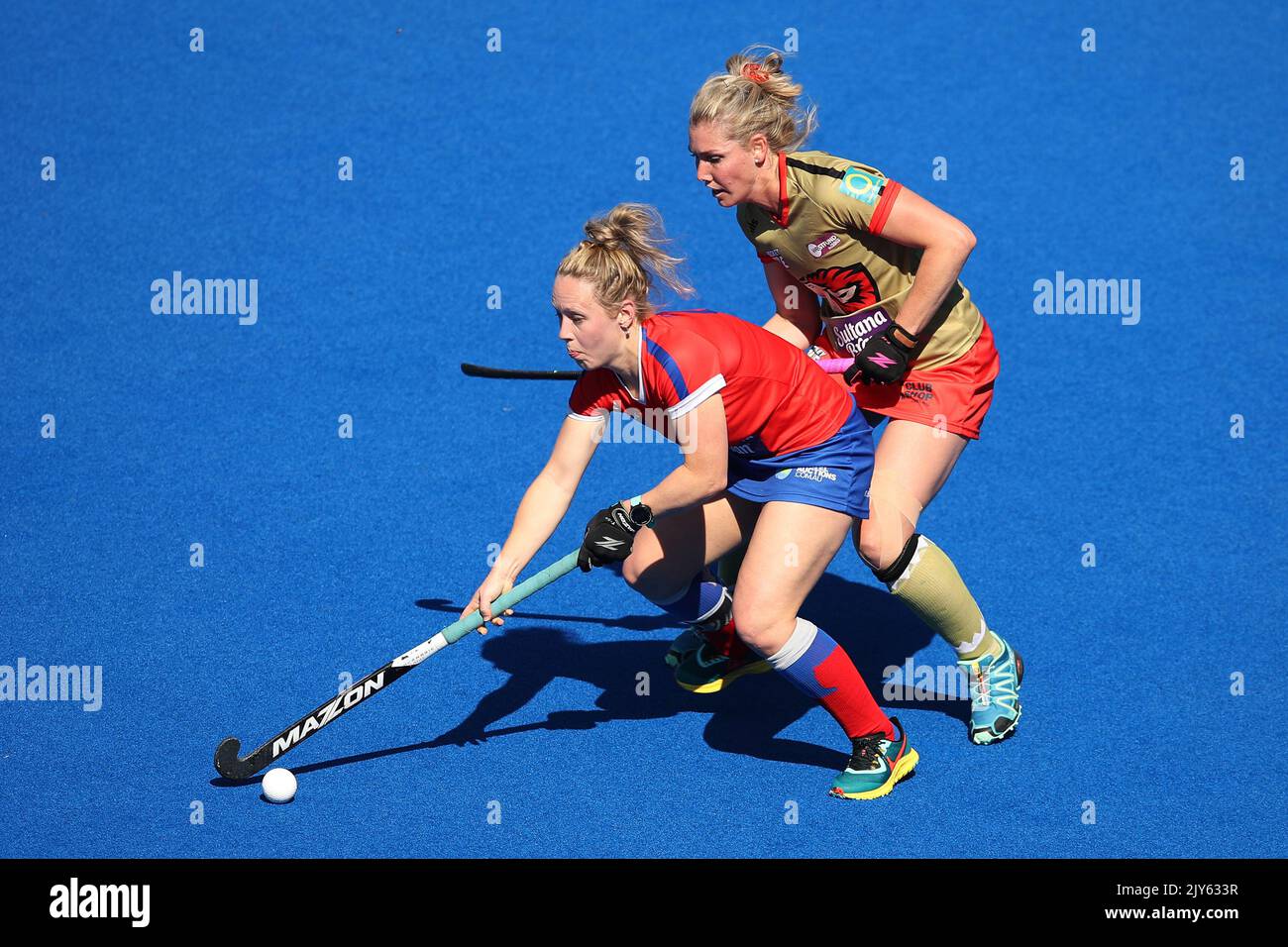 Holly Evans of the Fire competes with Casey Sablowski of the Pride ...