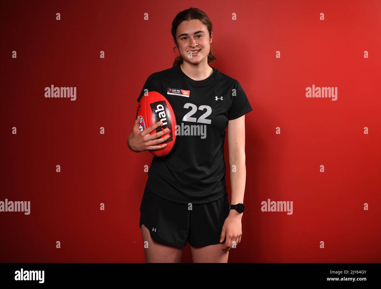Millie Brown poses for a photo during the 2019 AFL and AFLW Draft ...