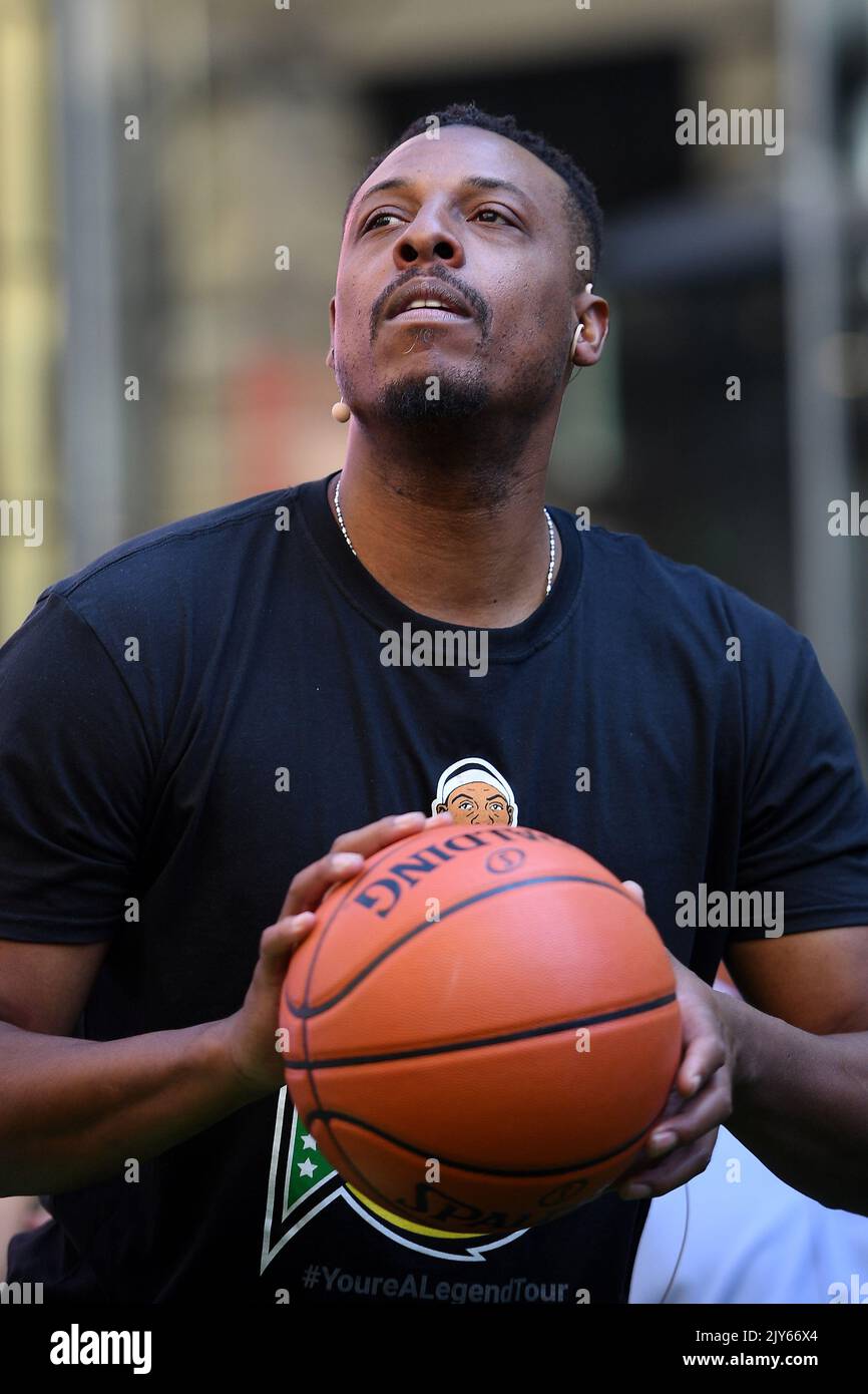 Former NBA player Paul Pierce shoots baskets during an NRL Fan Fest ...