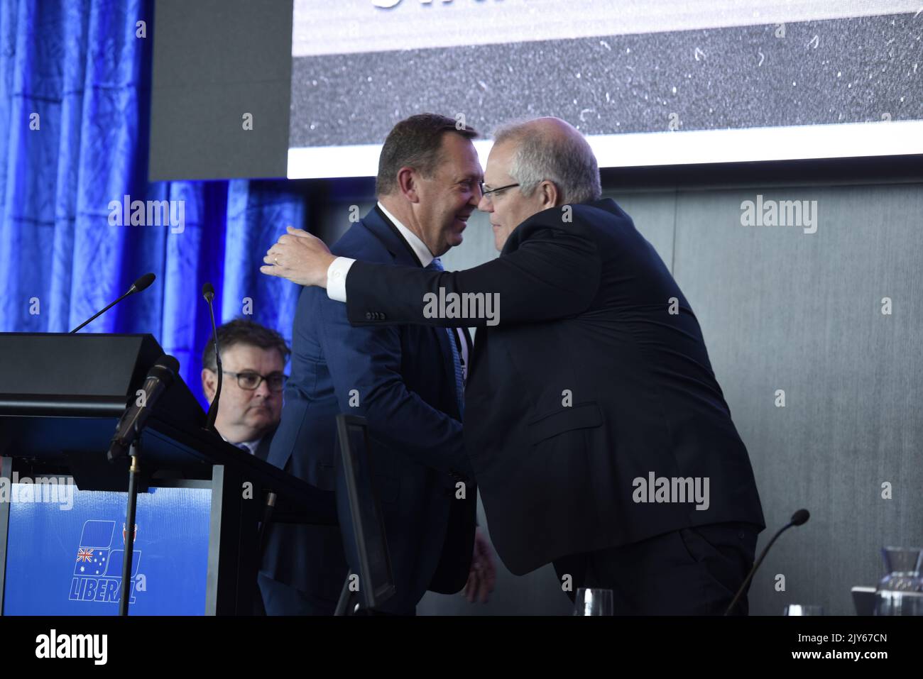 Prime Minister Scott Morrison (right) embraces Liberal candidate for ...