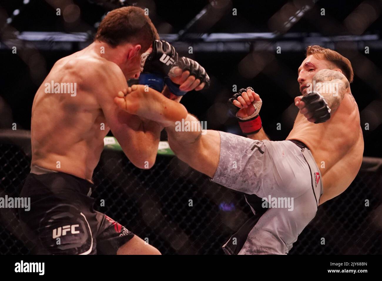 Brad Riddell and Jamie Mullarkey compete during UFC 243 at Marvel ...