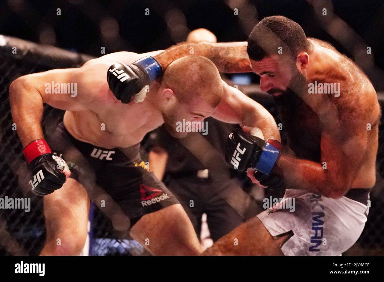 Jake Matthews and Rostem Akman compete during UFC 243 at Marvel Stadium ...