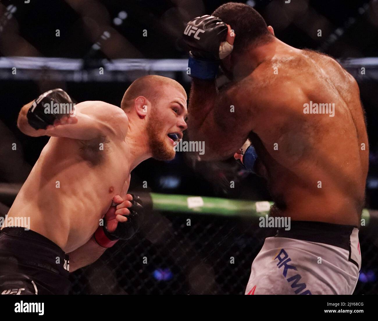 Jake Matthews and Rostem Akman compete during UFC 243 at Marvel Stadium ...