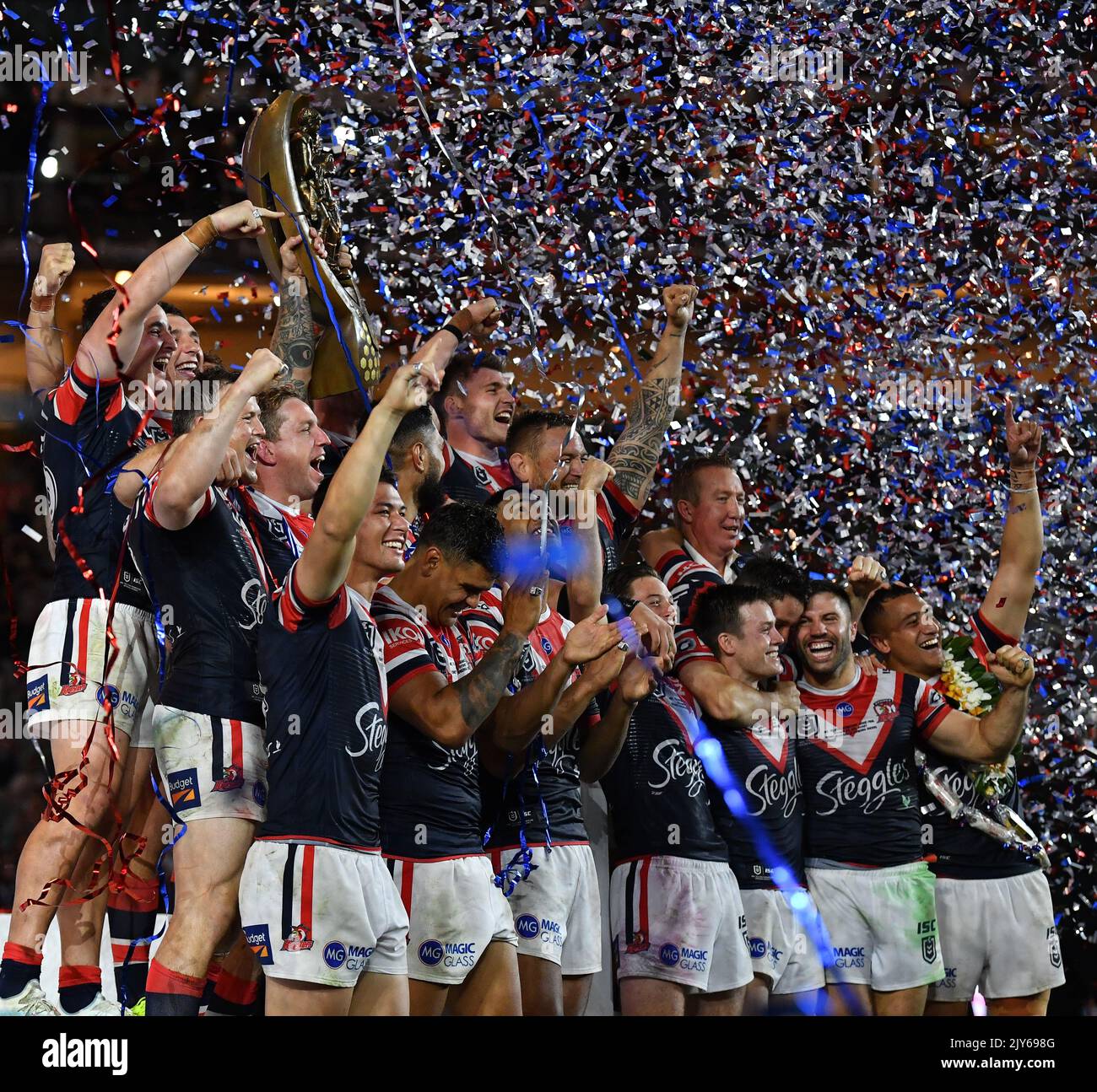 The Sydney Roosters celebrate after defeating the Raiders during the ...
